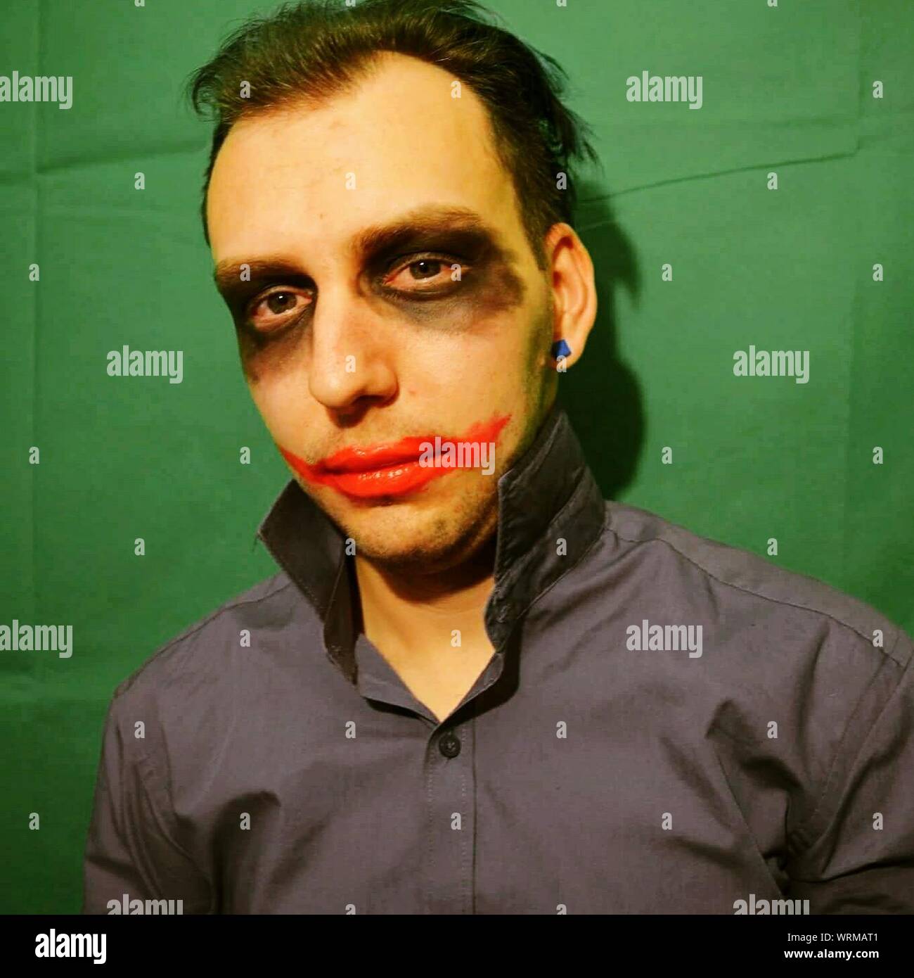 Green face paint hi-res stock photography and images - Alamy