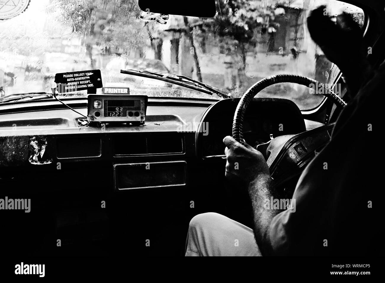 Person driving taxi hi-res stock photography and images - Alamy