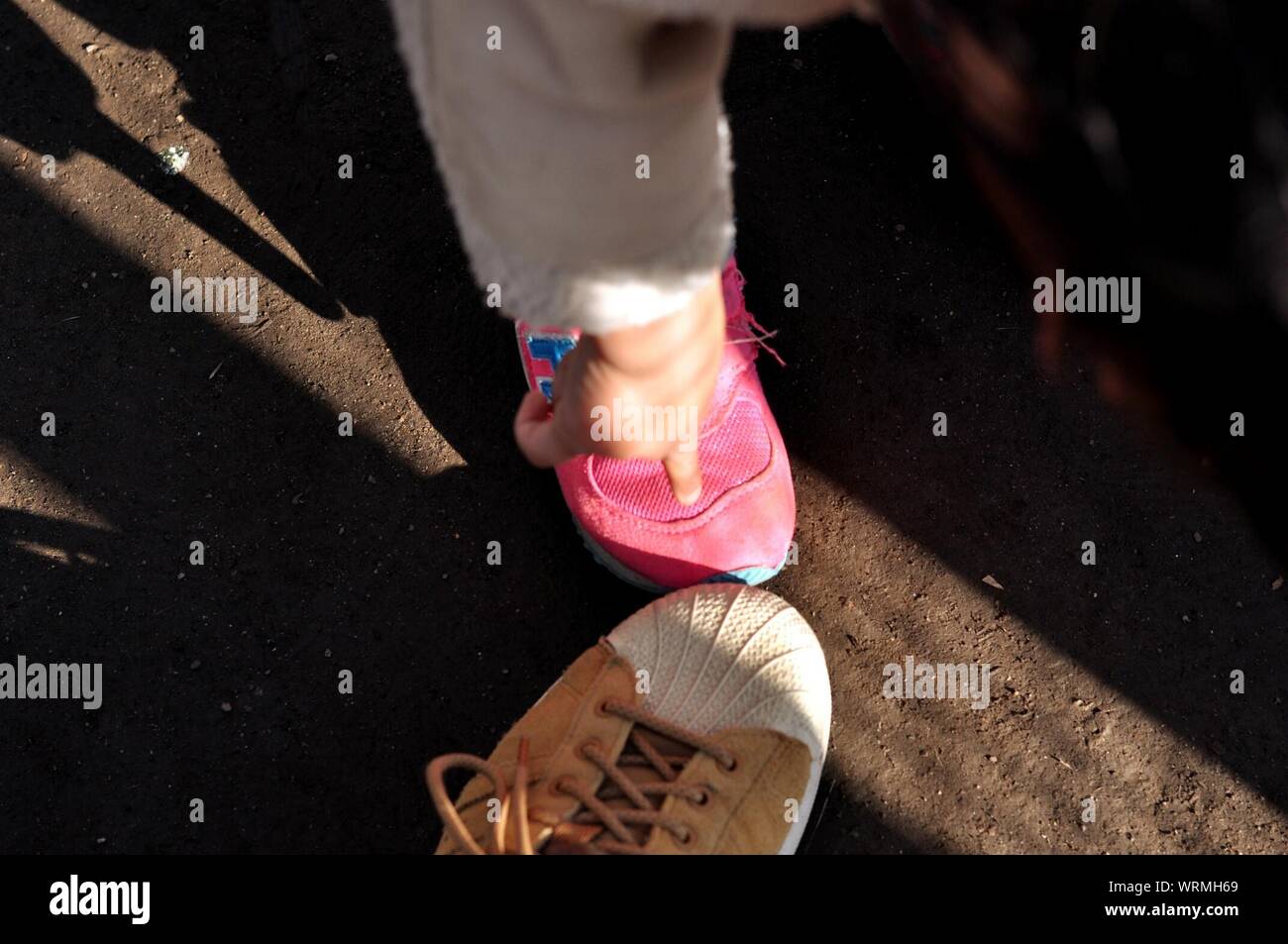 Pointing one foot hi-res stock photography and images - Alamy