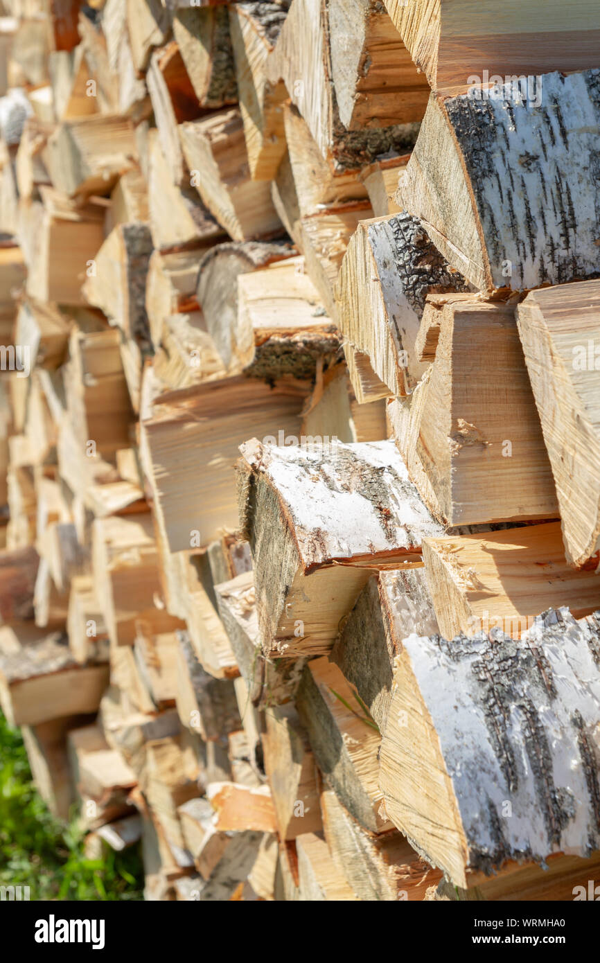 Dry chopped firewood lay in a pile on the street Stock Photo - Alamy