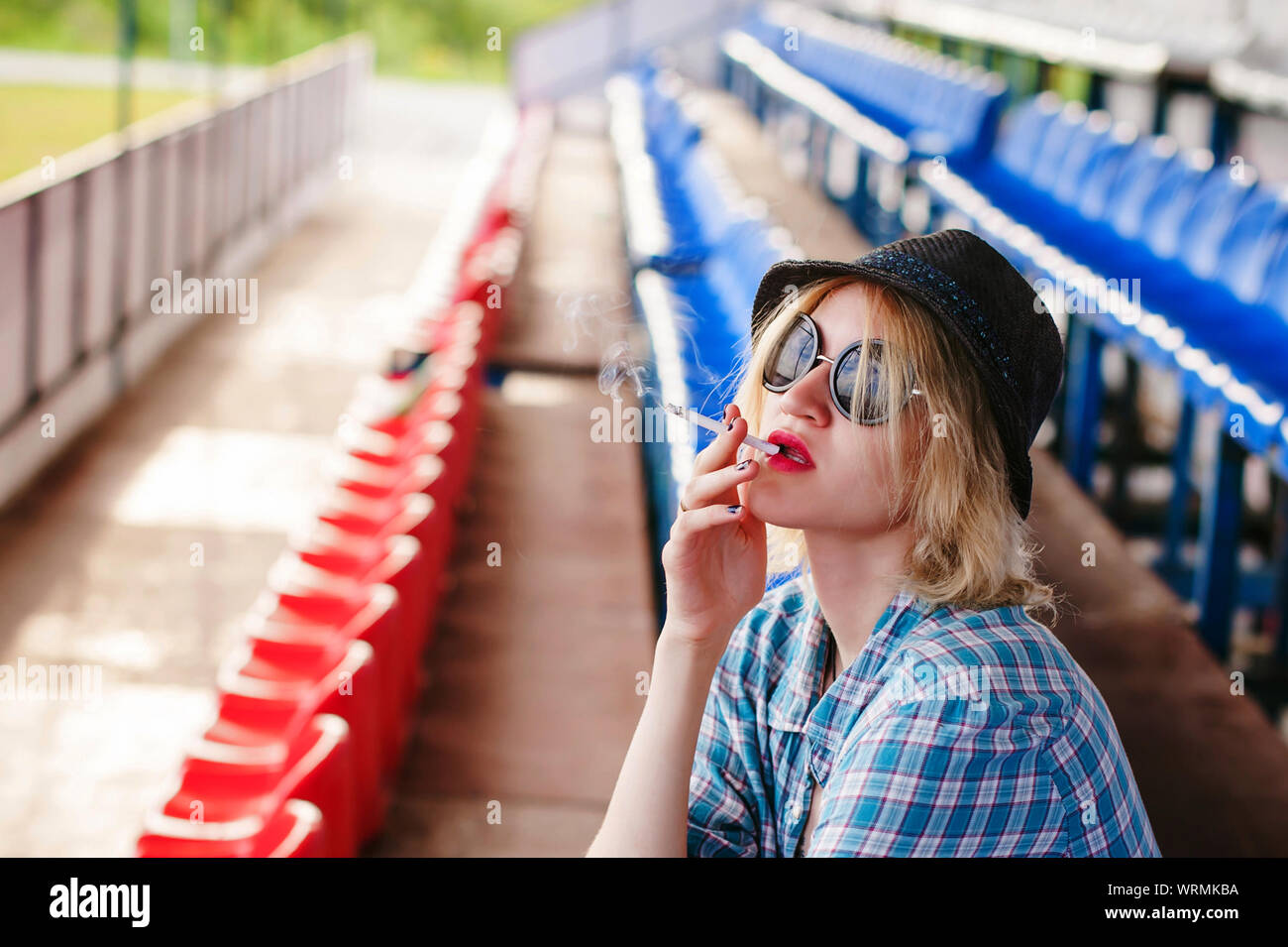 Smoking in stadium hi-res stock photography and images - Alamy