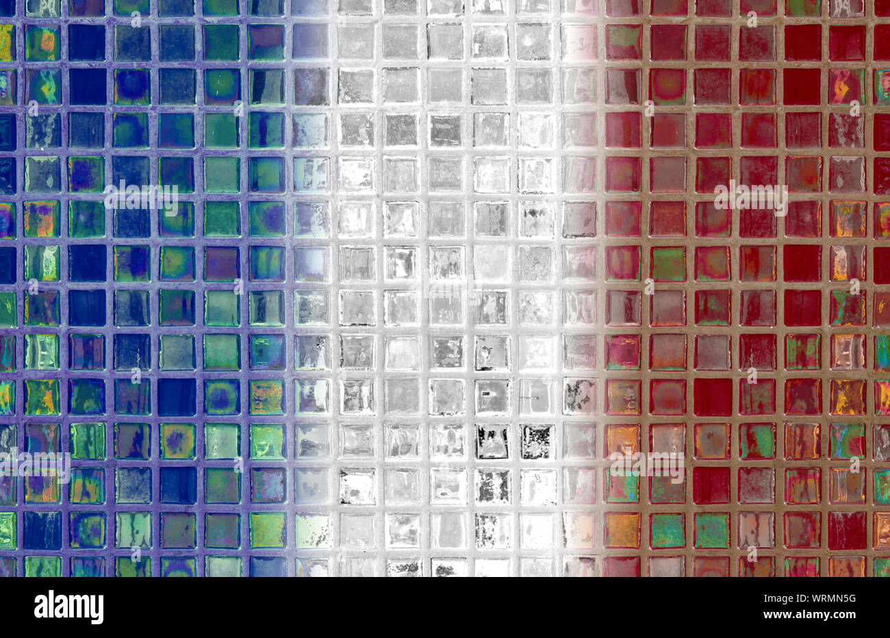 Tiled wall made by translucent tiles where colors form the flag of ...