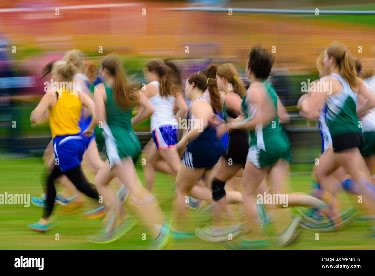 Group of female athletes running Stock Photo - Alamy
