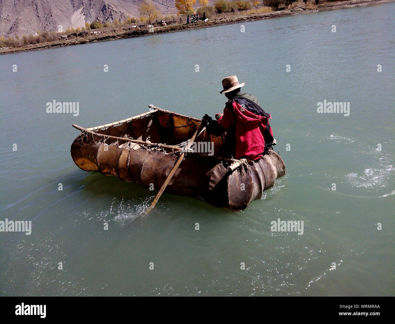 Man Sailing On Old-fashioned Raft In River Stock Photo - Alamy