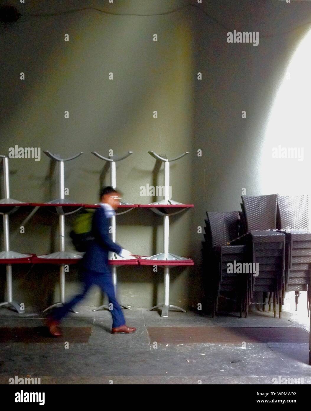 Man walking by restaurant hi-res stock photography and images - Alamy