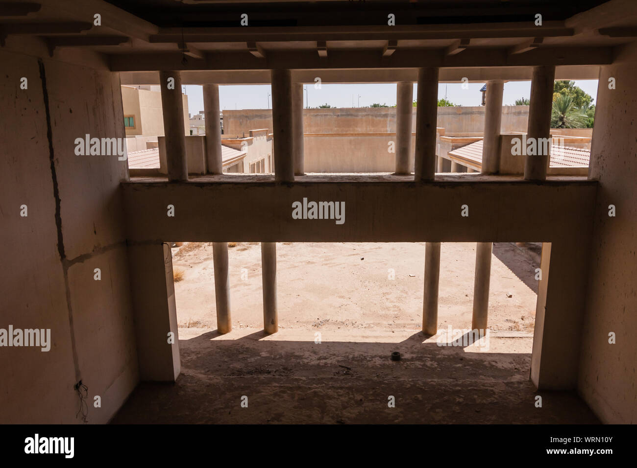 A garage and a view of the backyard of the abandoned luxury villa in ...