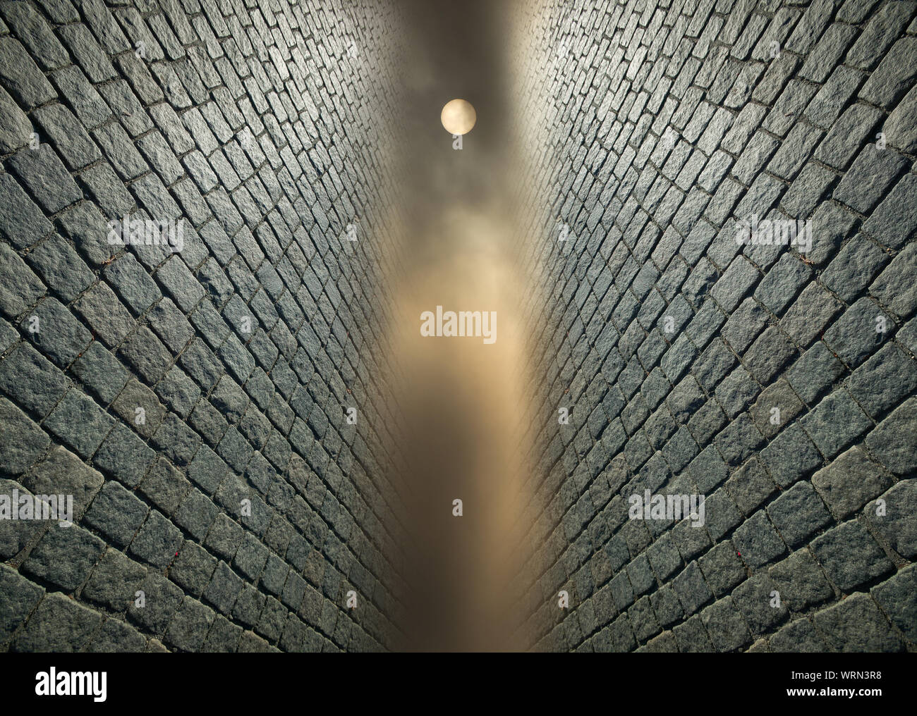 The sun between two brick walls Stock Photo - Alamy
