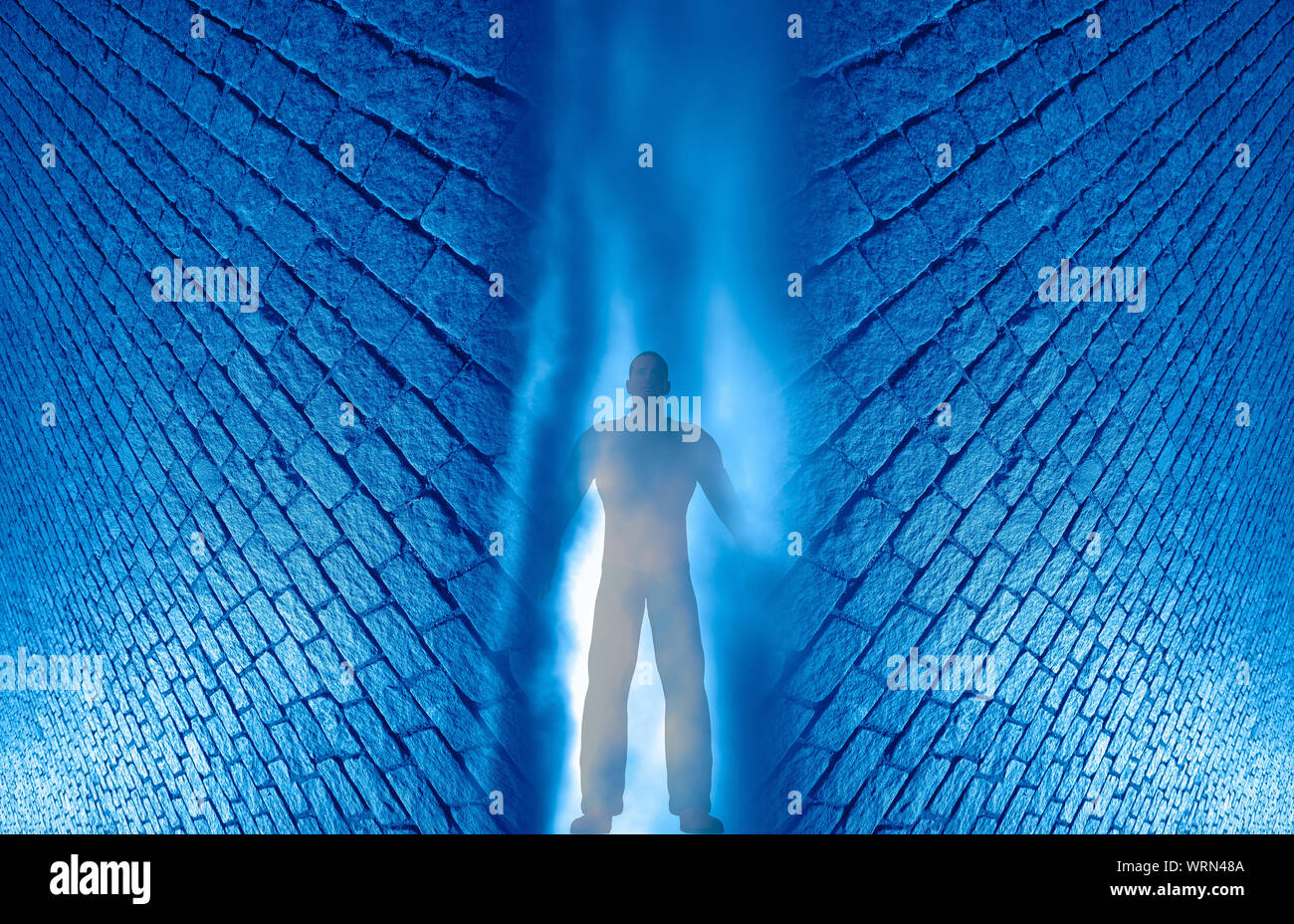 Digitsally manipulated man appearing from smoke between two brick walls ...