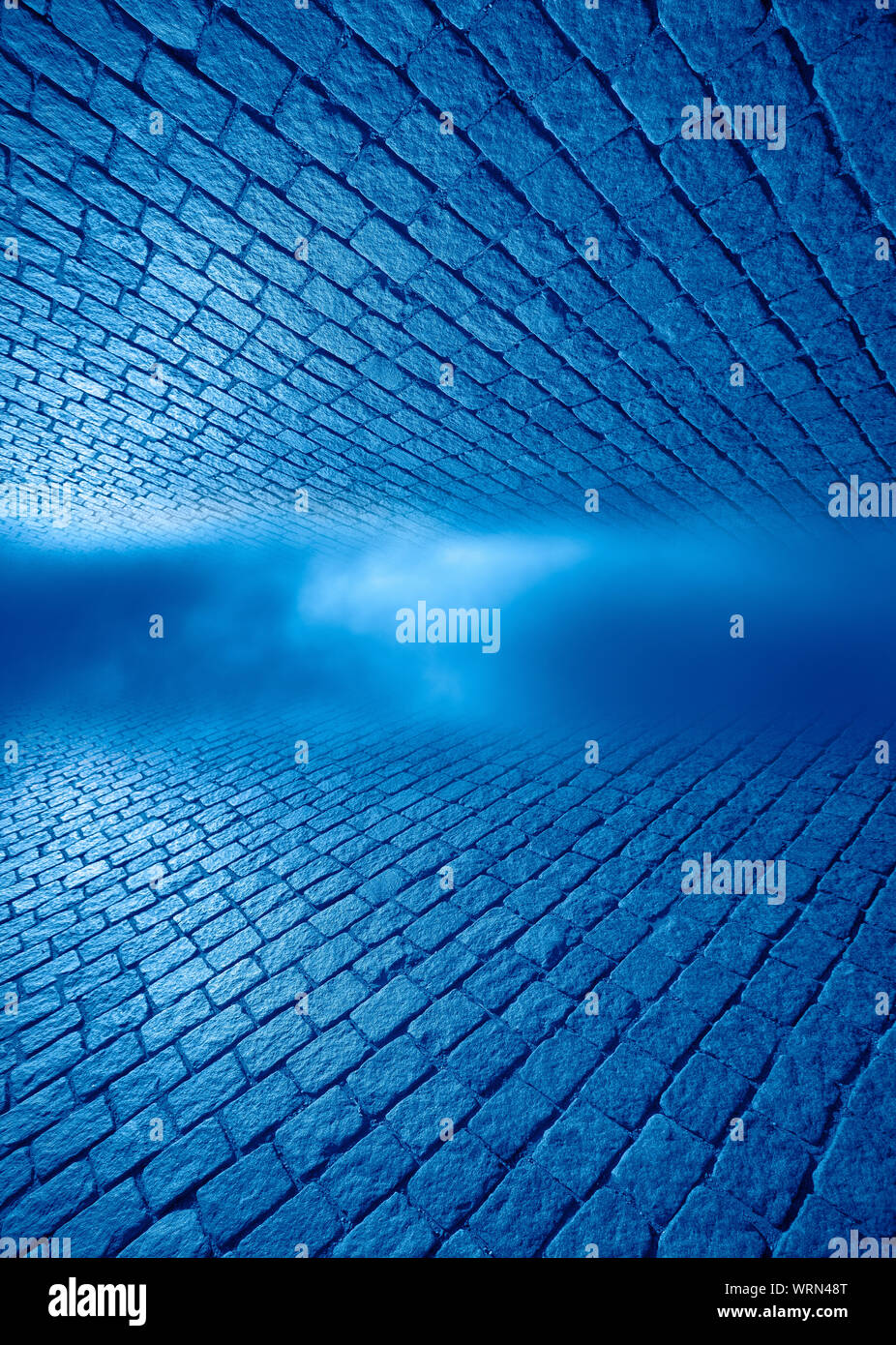 Blue space between a brick floor and ceiling Stock Photo - Alamy