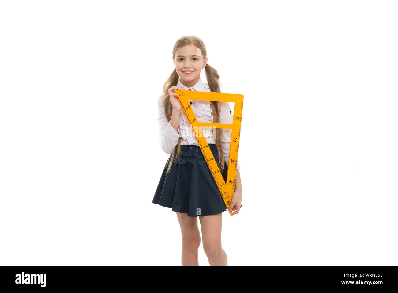 Small child with measuring instrument school lesson. Little girl ...