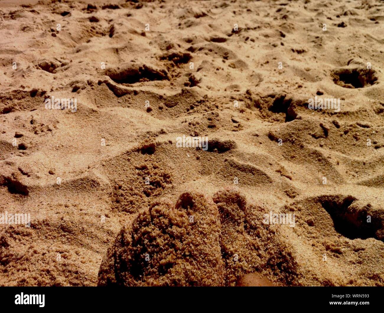 Body Covered Sand High Resolution Stock Photography and Images - Alamy