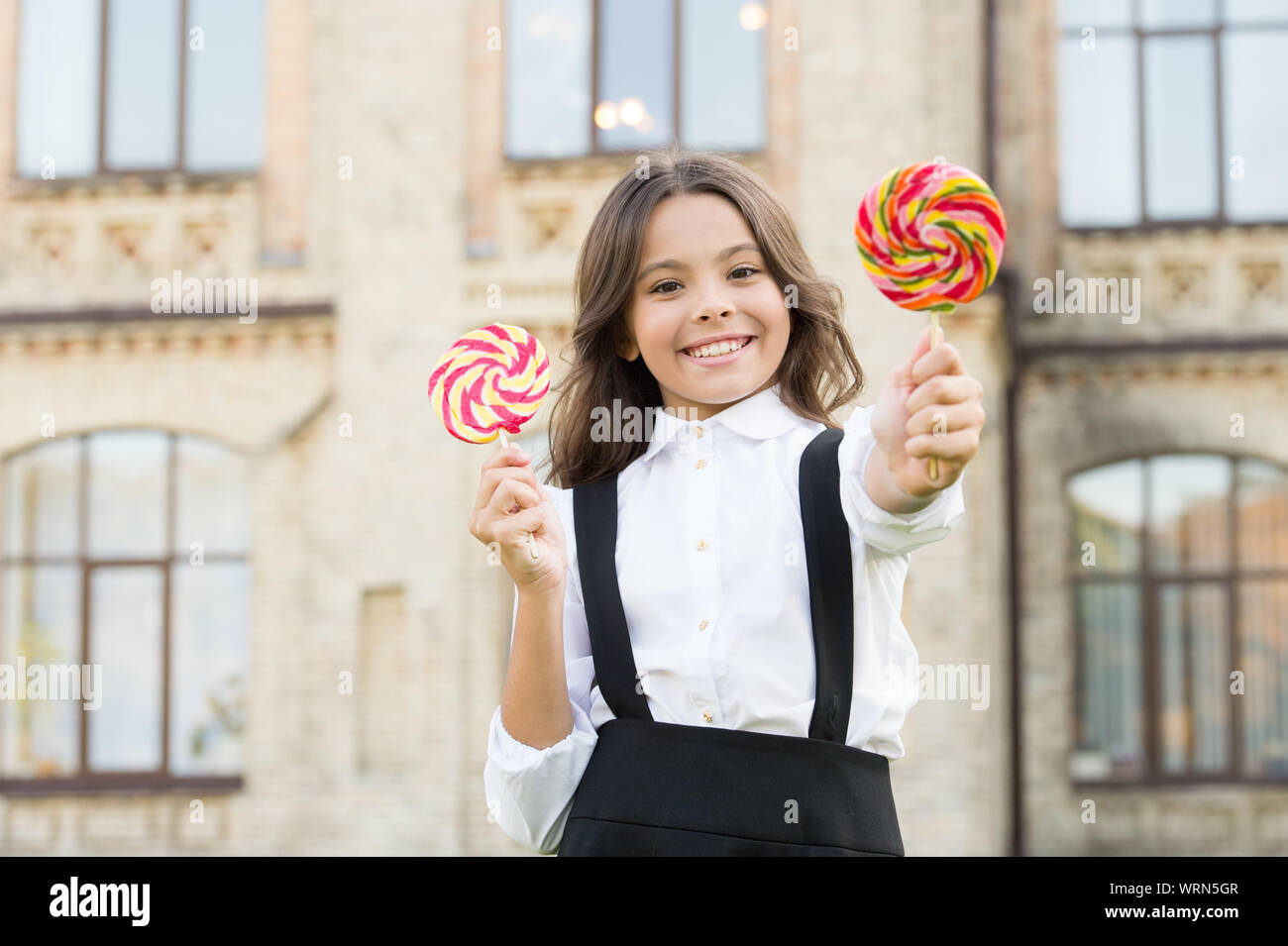 Crazy about sweets. Sugar addiction. Cheat meal day. Happy kid with ...