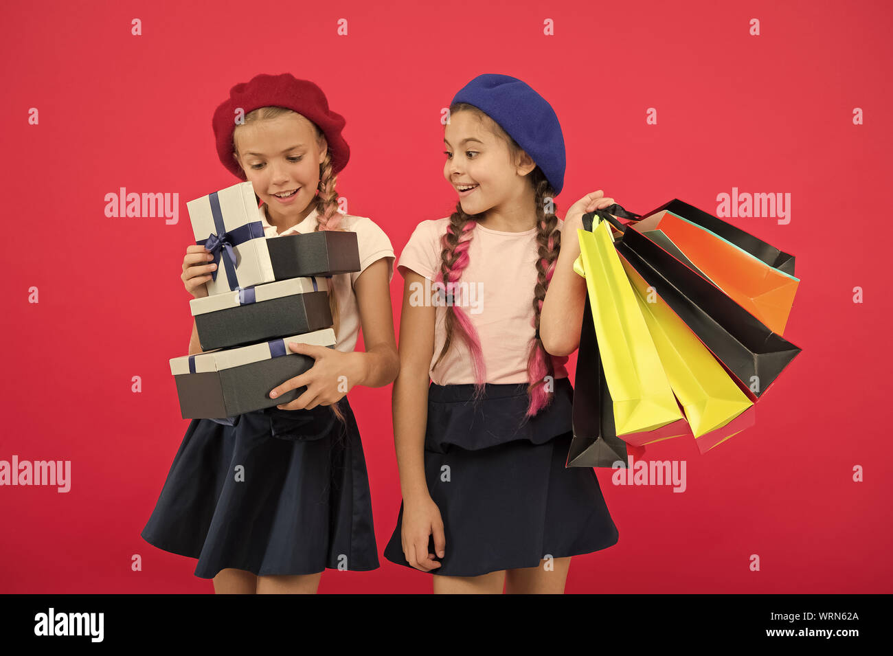 Shopaholic concept. Shopping become fun with best friends. Kids cute ...