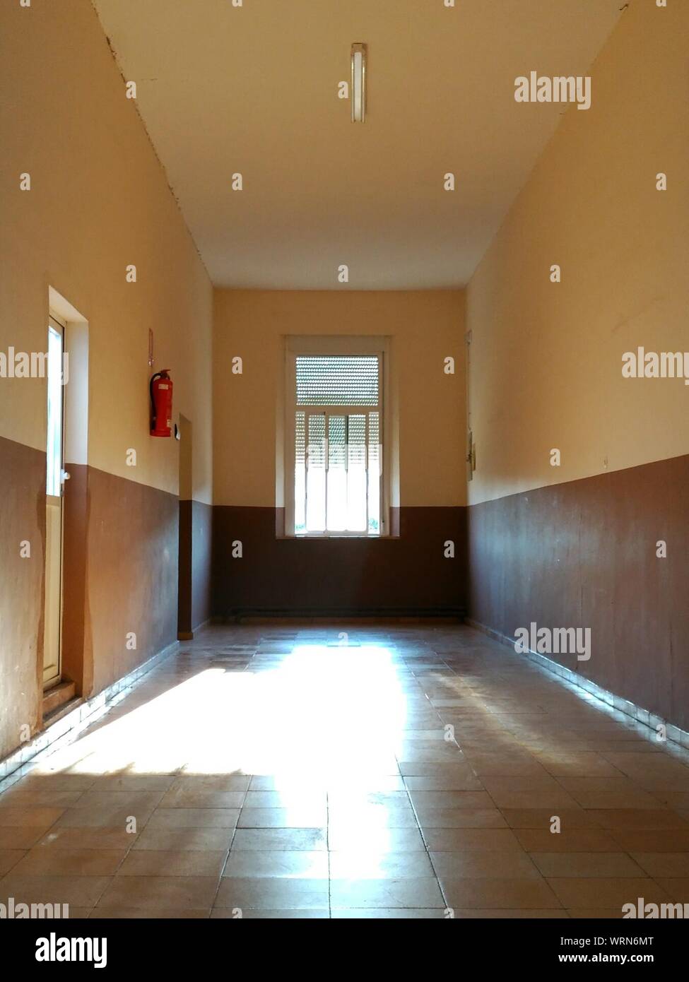 Corridor fire extinguisher hi-res stock photography and images - Alamy