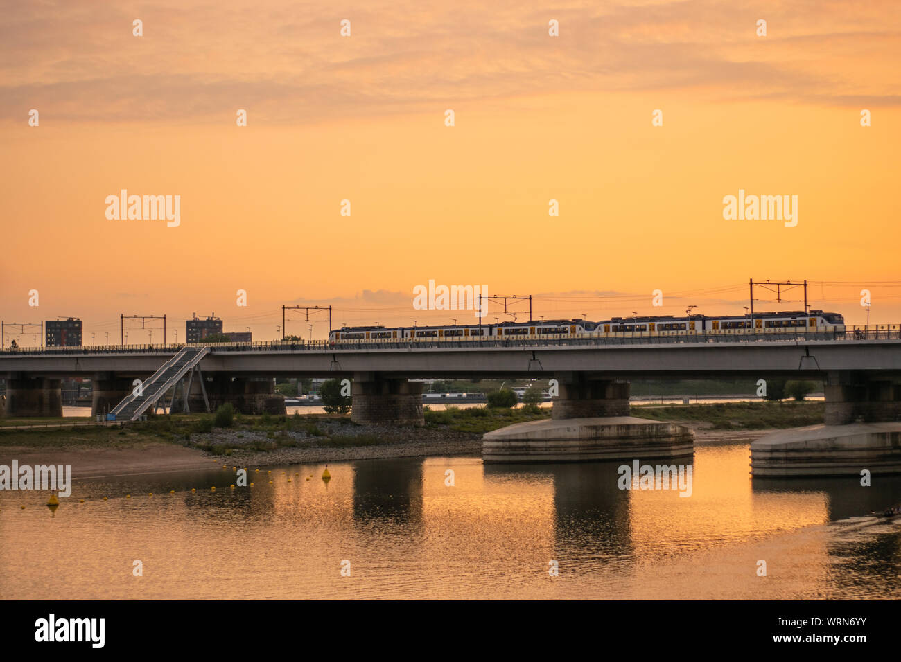 Train crossing bridge over highway hi-res stock photography and images ...