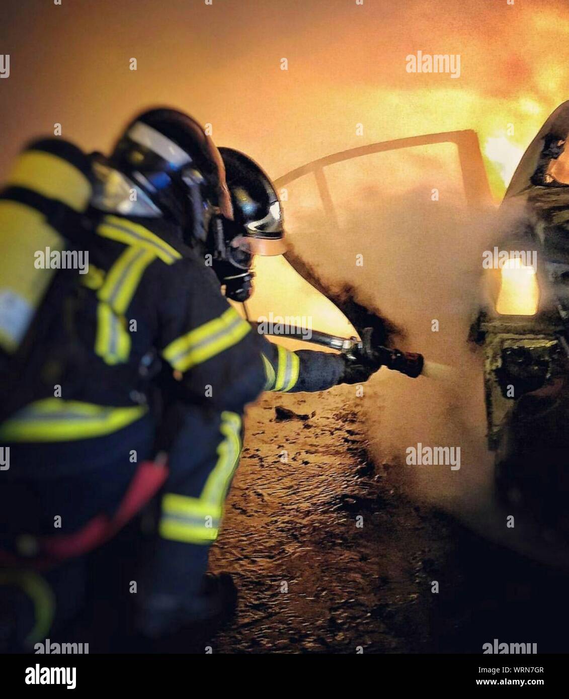 Fire engine spraying water on hi-res stock photography and images - Alamy