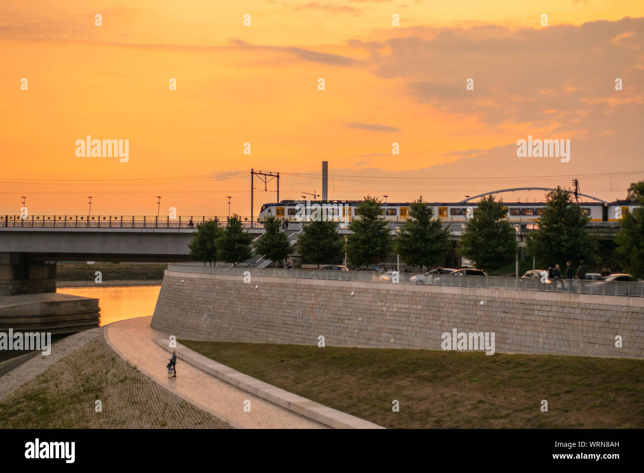 Train crossing bridge over highway hi-res stock photography and images ...