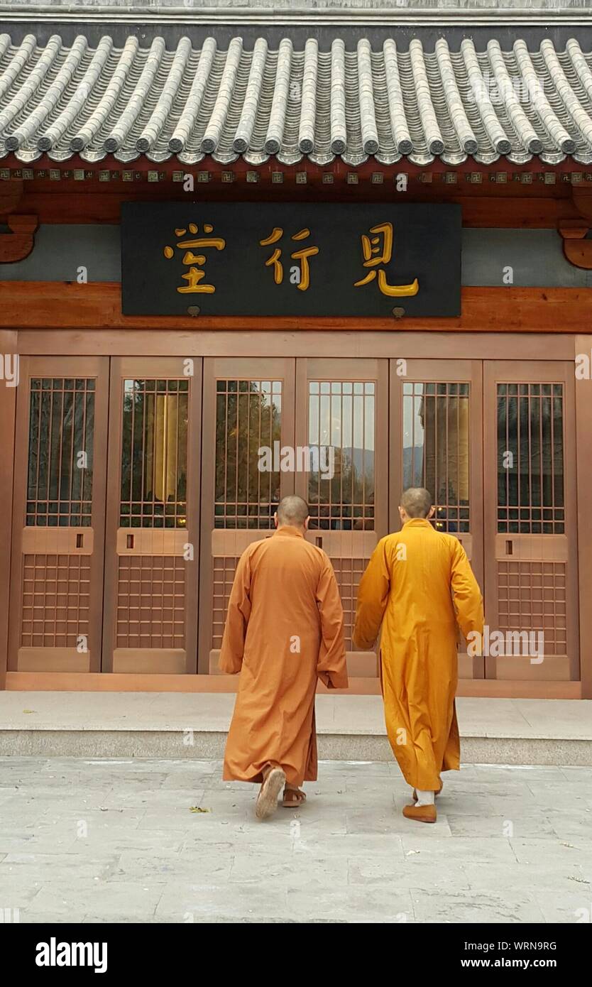 Entering the temple hi-res stock photography and images - Alamy