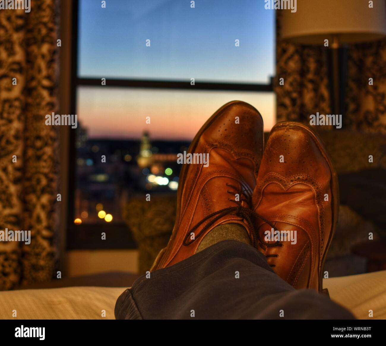 Legs Wearing Jeans Shoes Sitting High Resolution Stock Photography and ...