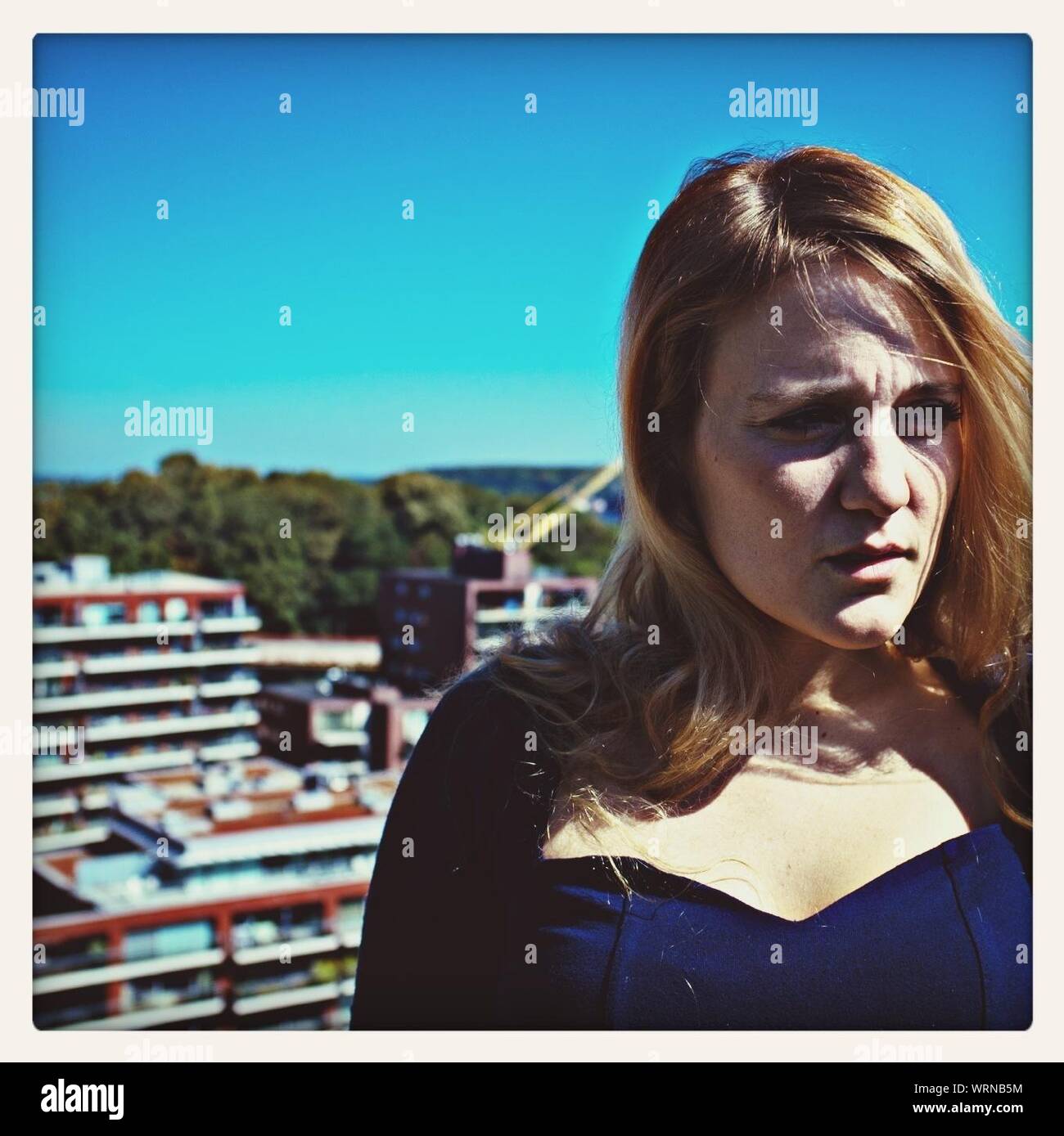 Woman buildings hi-res stock photography and images - Alamy