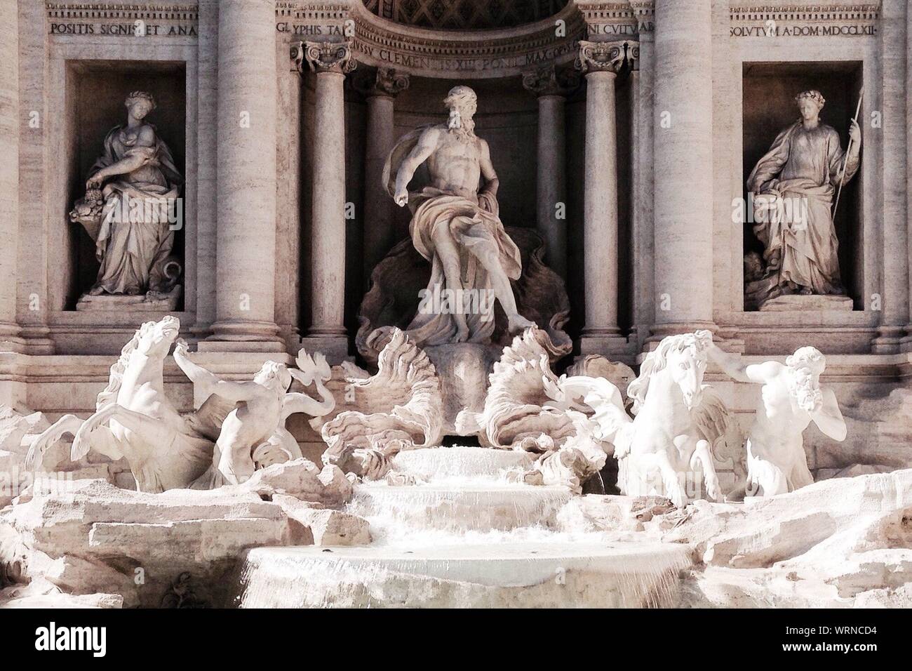 Statues of the famous trevi fountain hi-res stock photography and ...
