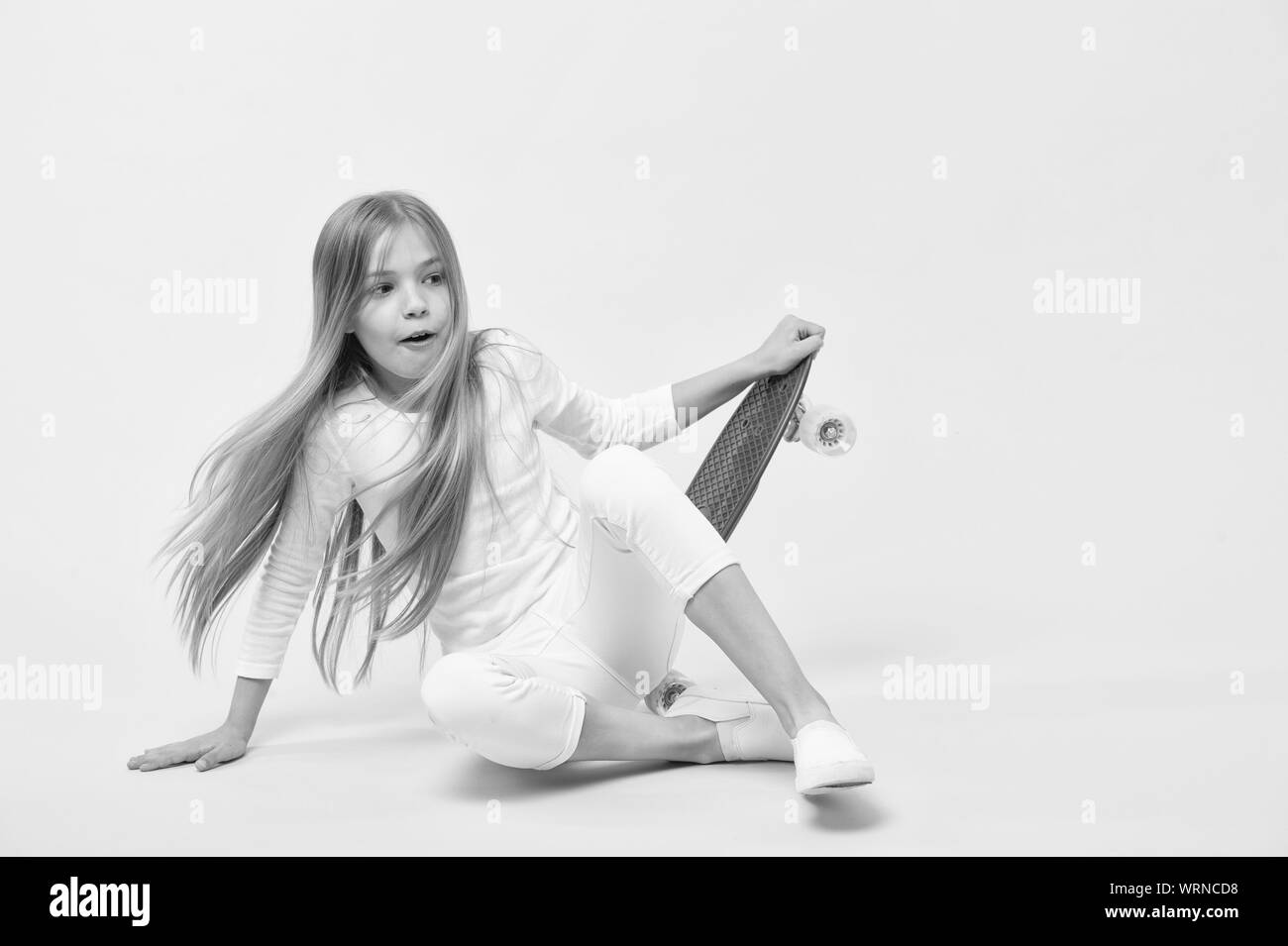 Seeking for extreme freedom and drive. Adorable extreme athlete on pink ...