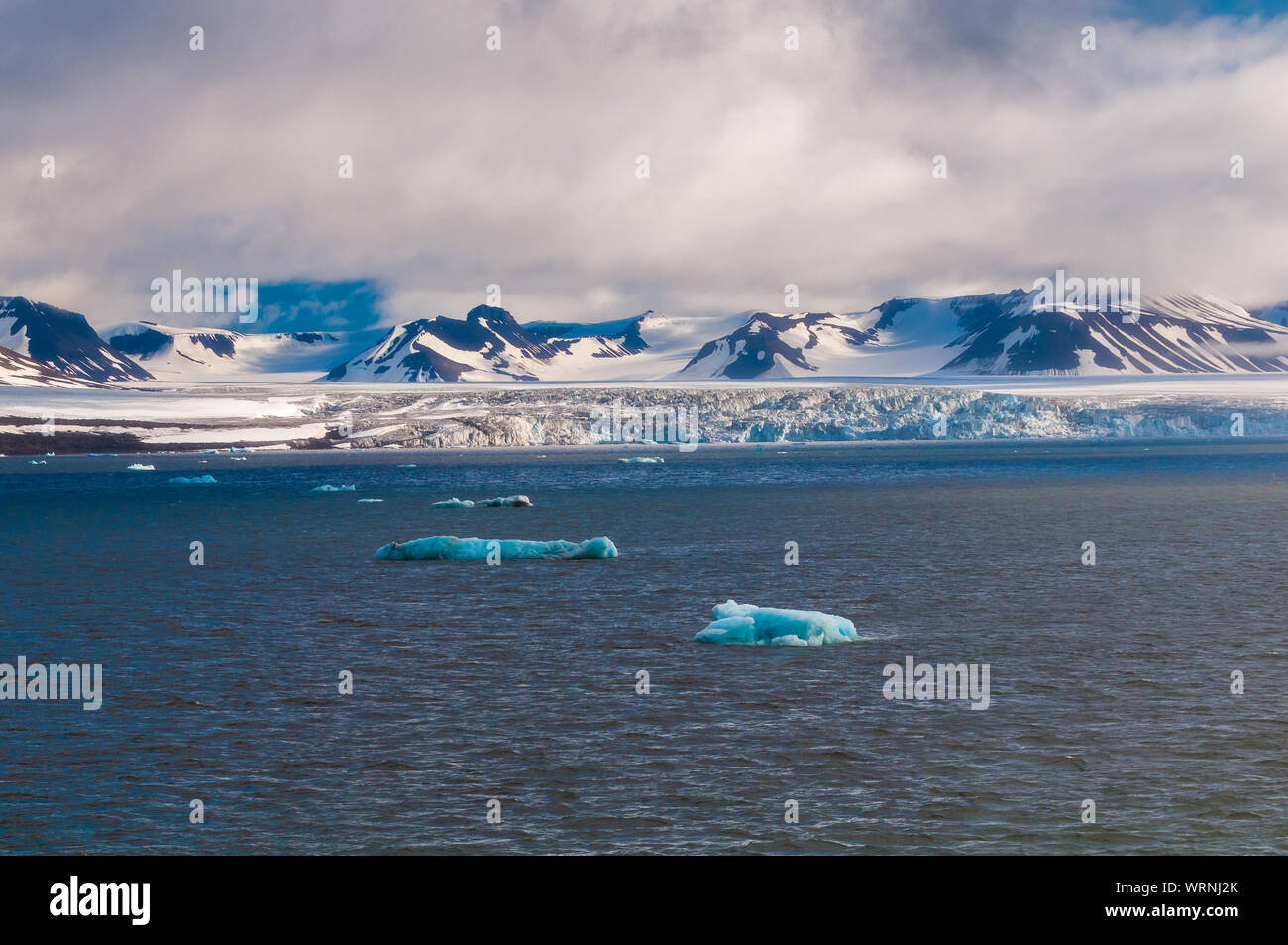 The end of a glacier in the Arctic Circle where it falls into the ...