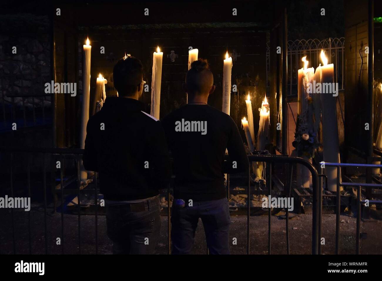 Three men praying hi-res stock photography and images - Alamy