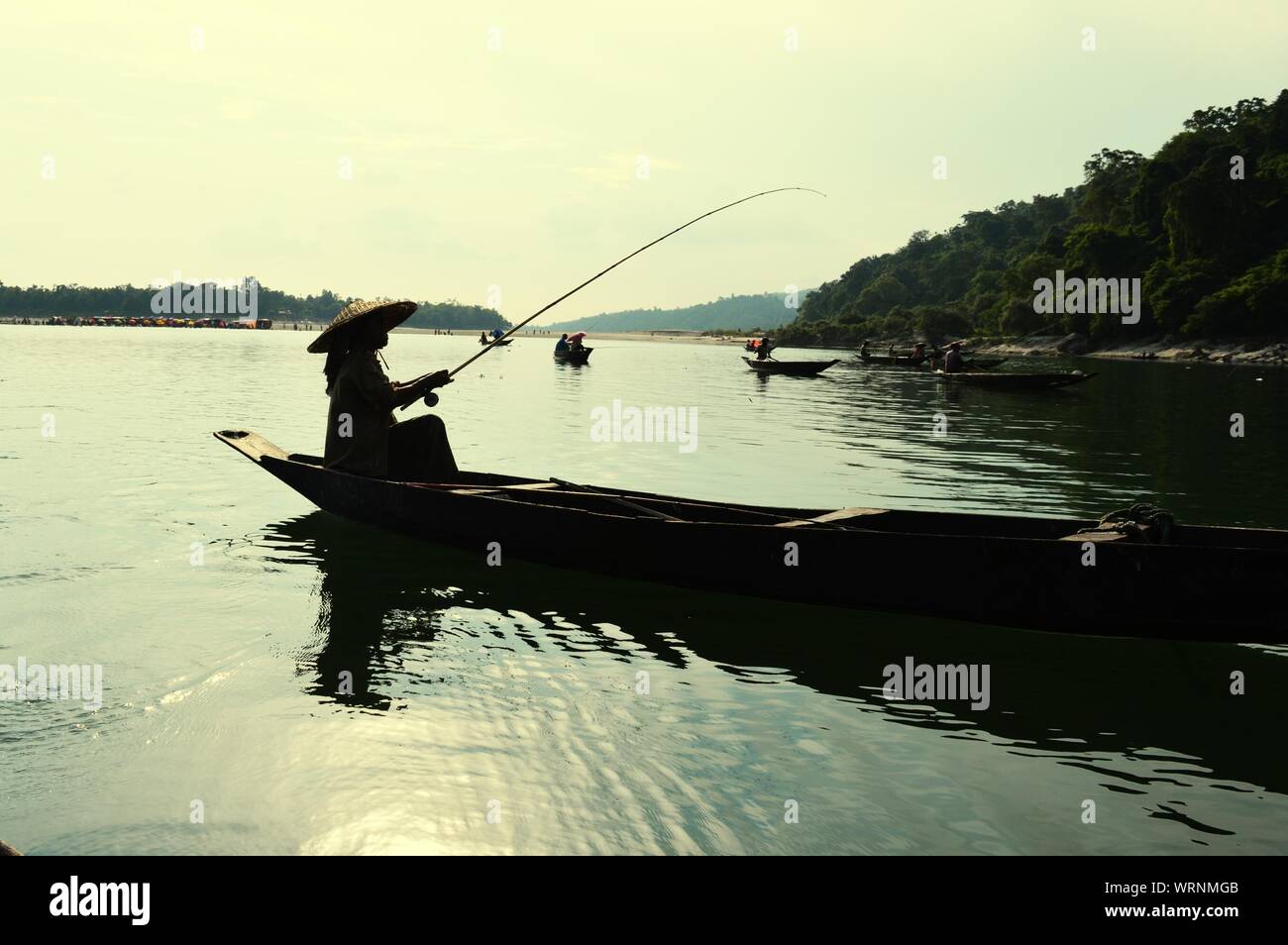 Asian woman fishing hi-res stock photography and images - Alamy