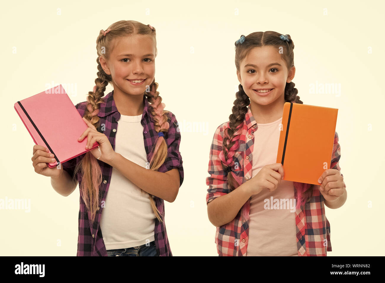 Children cute girls hold notepads or diaries isolated on white ...