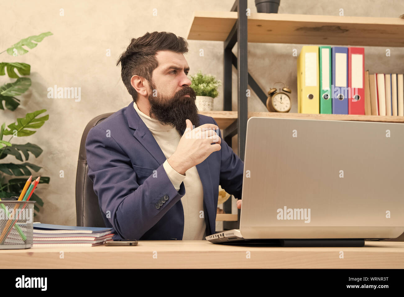 system administrator servicing server rack. configuration of computer ...