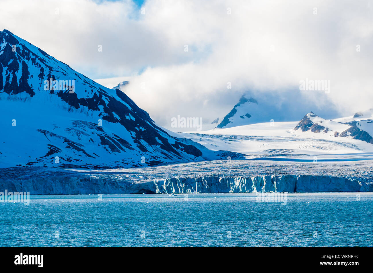 The end of a glacier in the Arctic Circle where it falls into the ...