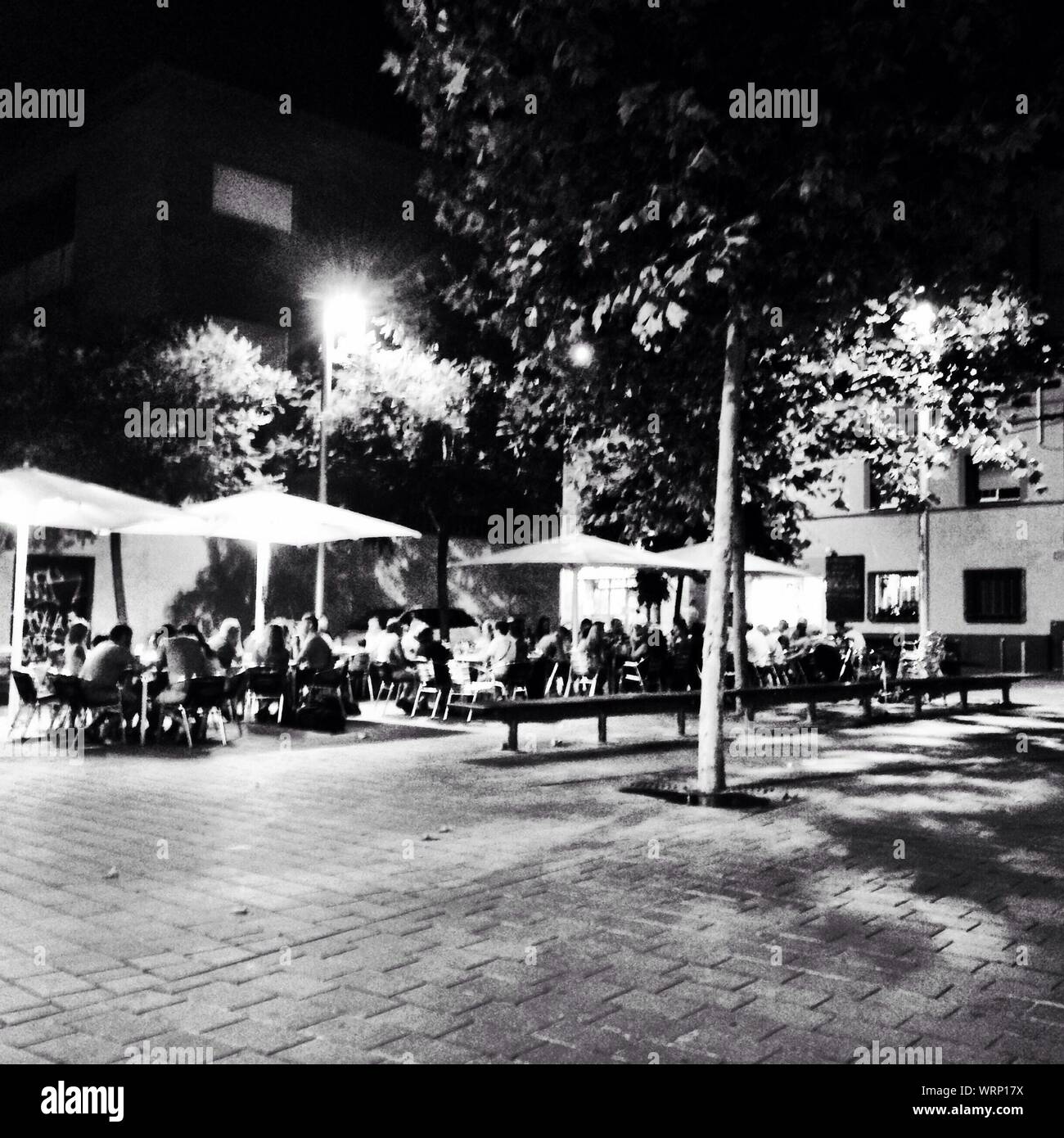 Sidewalk cafe at night hi-res stock photography and images - Alamy