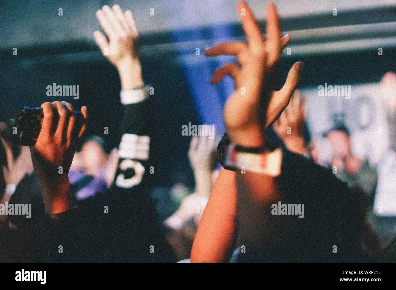 Raised hands hi-res stock photography and images - Alamy