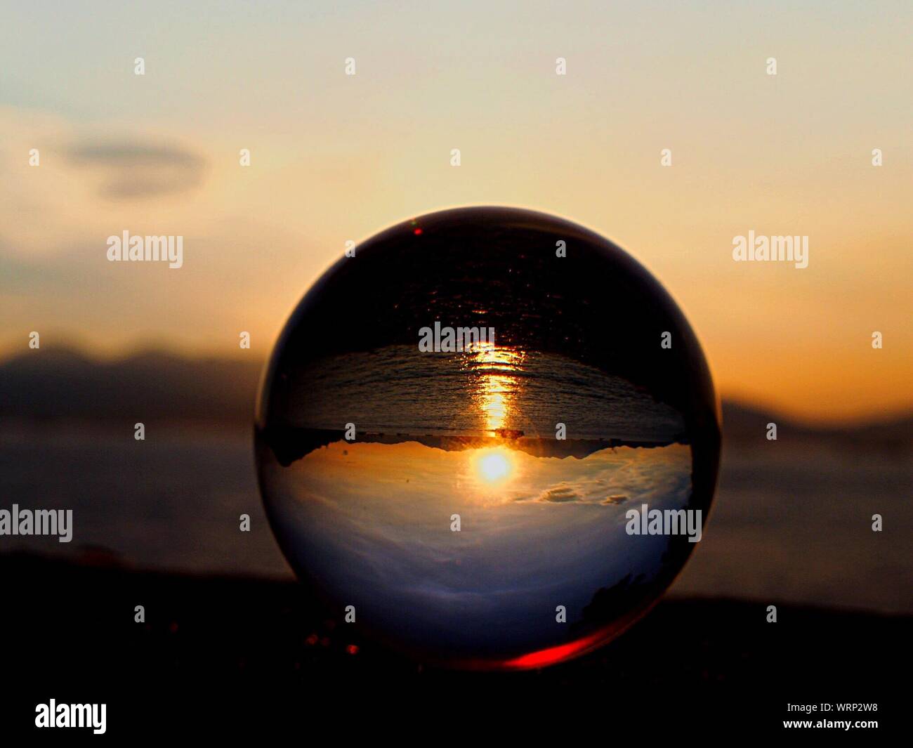 Glass ball on beach hi-res stock photography and images - Alamy