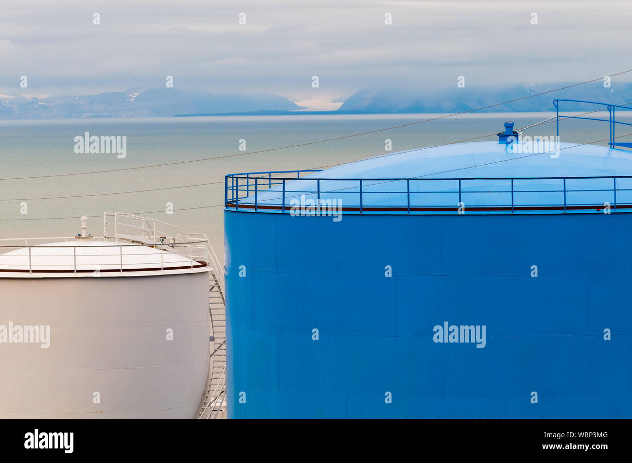 Colorful fuel storage tanks on the coastline of Longyearbyen, Svalbard ...
