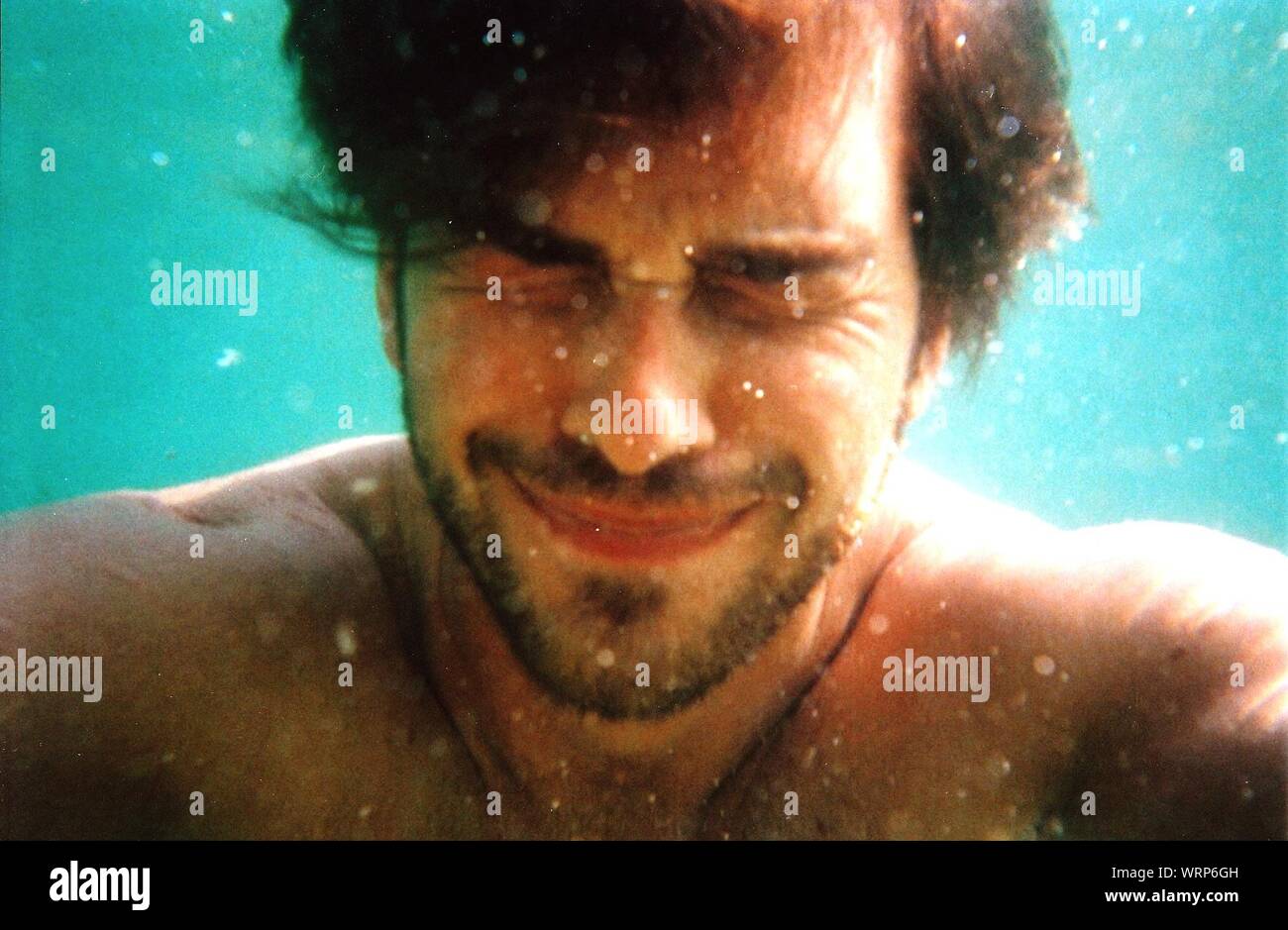 Man smiling underwater underwater view hi-res stock photography and ...