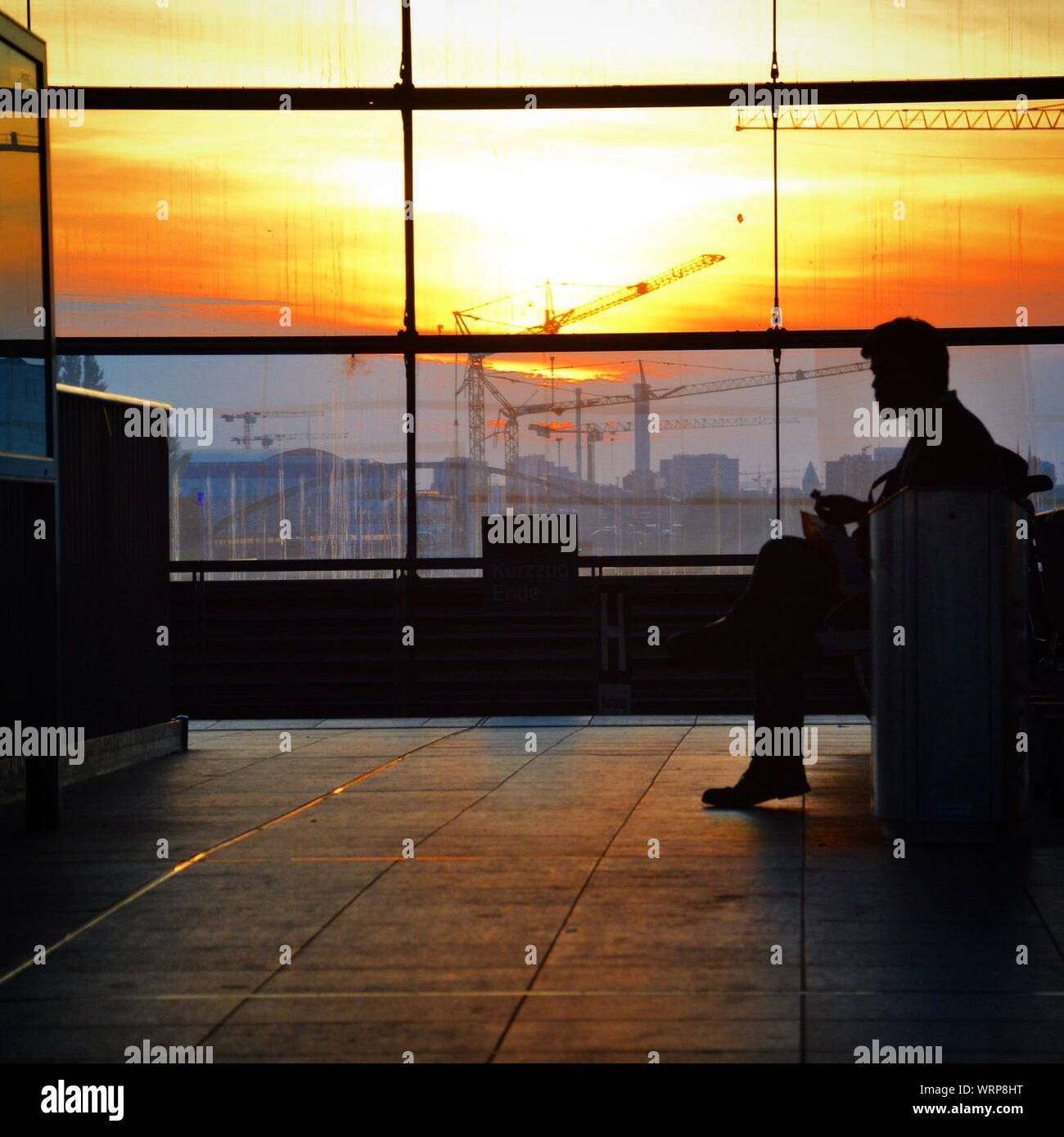 Silhouette Man Sitting In Window High Resolution Stock Photography and ...
