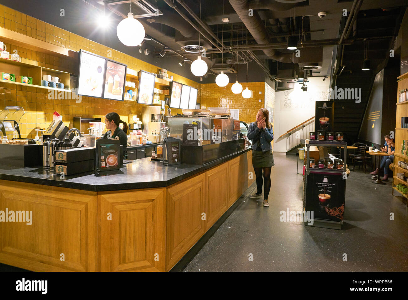 COLOGNE, GERMANY - CIRCA SEPTEMBER, 2018: interior shot of Starbucks ...