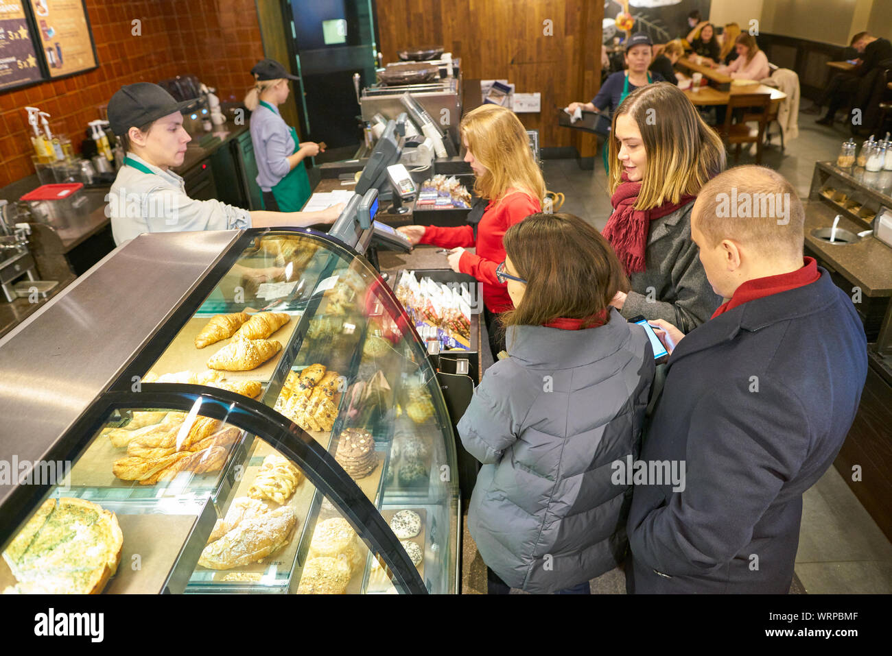 Queue Line People Starbucks Cafe High Resolution Stock Photography and ...