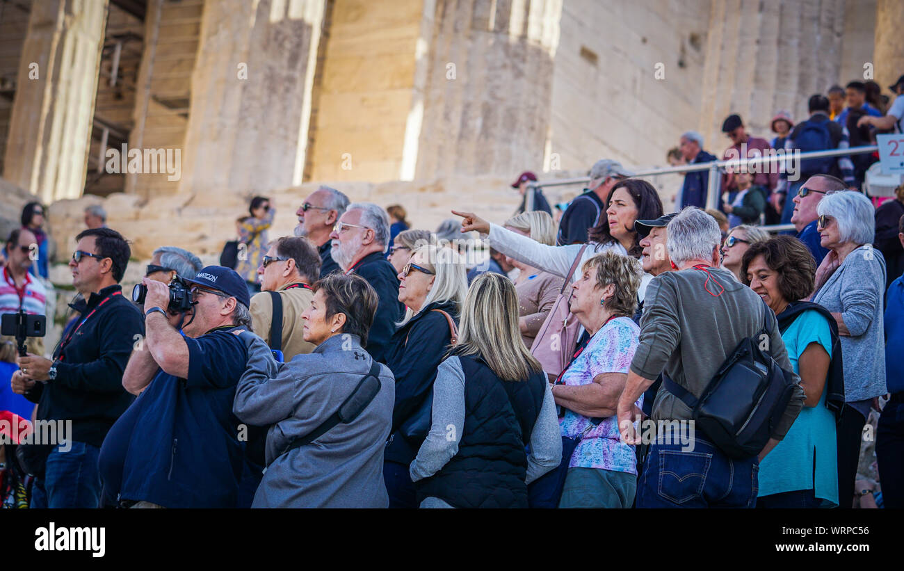 Tourists visit the Parthenon archaeological site in Central Athens ...