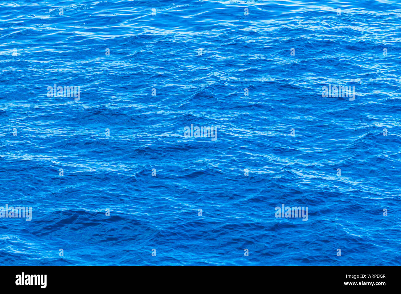 Deep blue ocean water in the Arctic Circle near Barentsoya, Svalbard ...