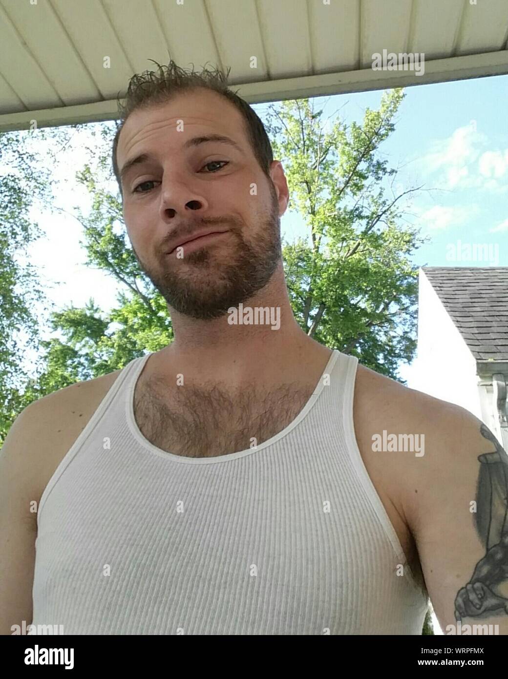 Man Wearing White Vest High Resolution Stock Photography and Images - Alamy