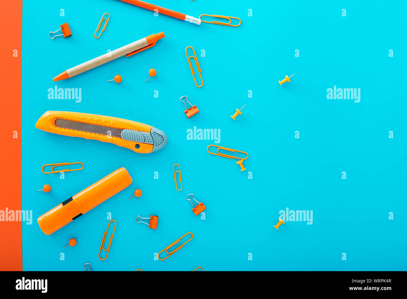 School and office supplies frame, on blue background with copy space ...