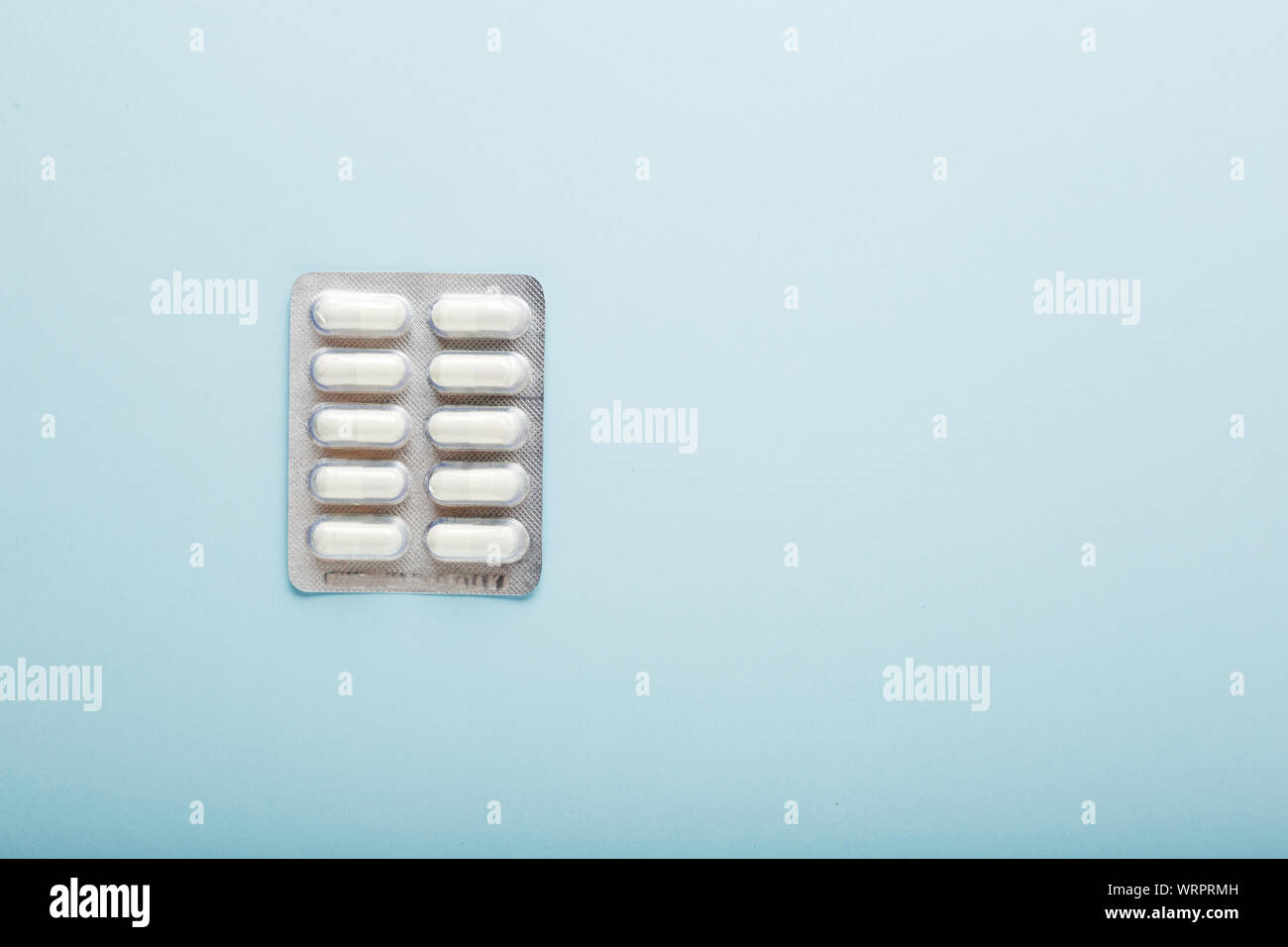 tablets and capsules pill in blister packaging. Pharmaceutical industry ...