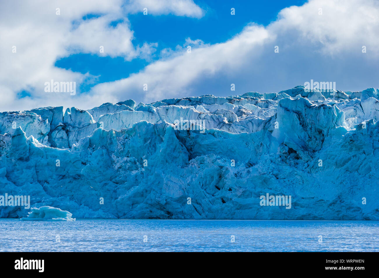 The end of a glacier in the Arctic Circle where it falls into the ...