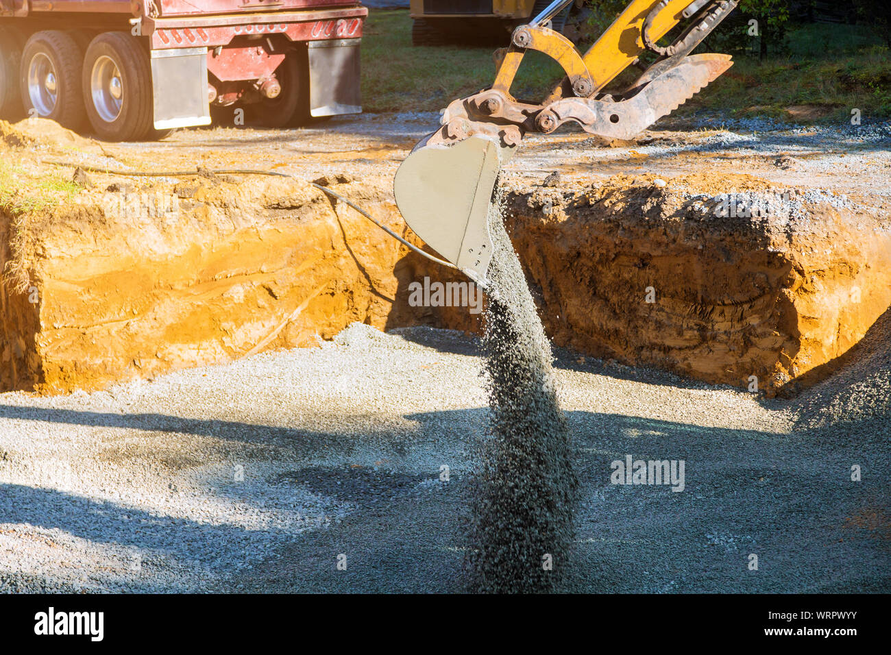 Close up excavator working on a construction site, excavator bucket ...