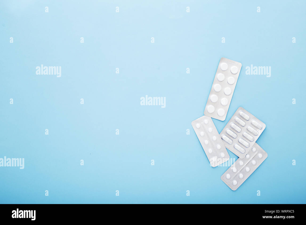 tablets and capsules pill in blister packaging. Pharmaceutical industry ...
