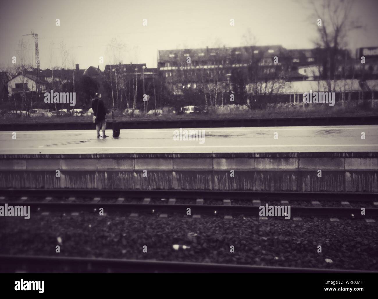 Man waiting for train on platform hi-res stock photography and images ...