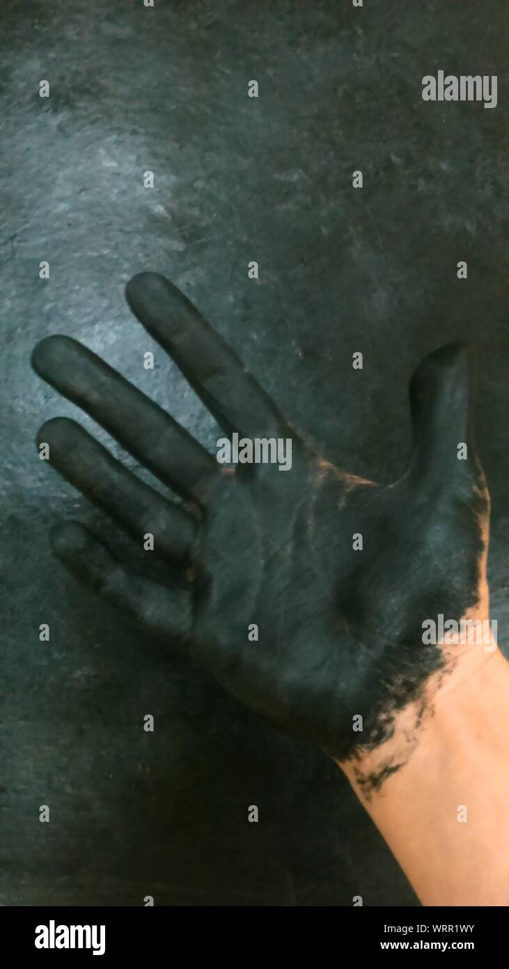 Black hand palm up hi-res stock photography and images - Alamy